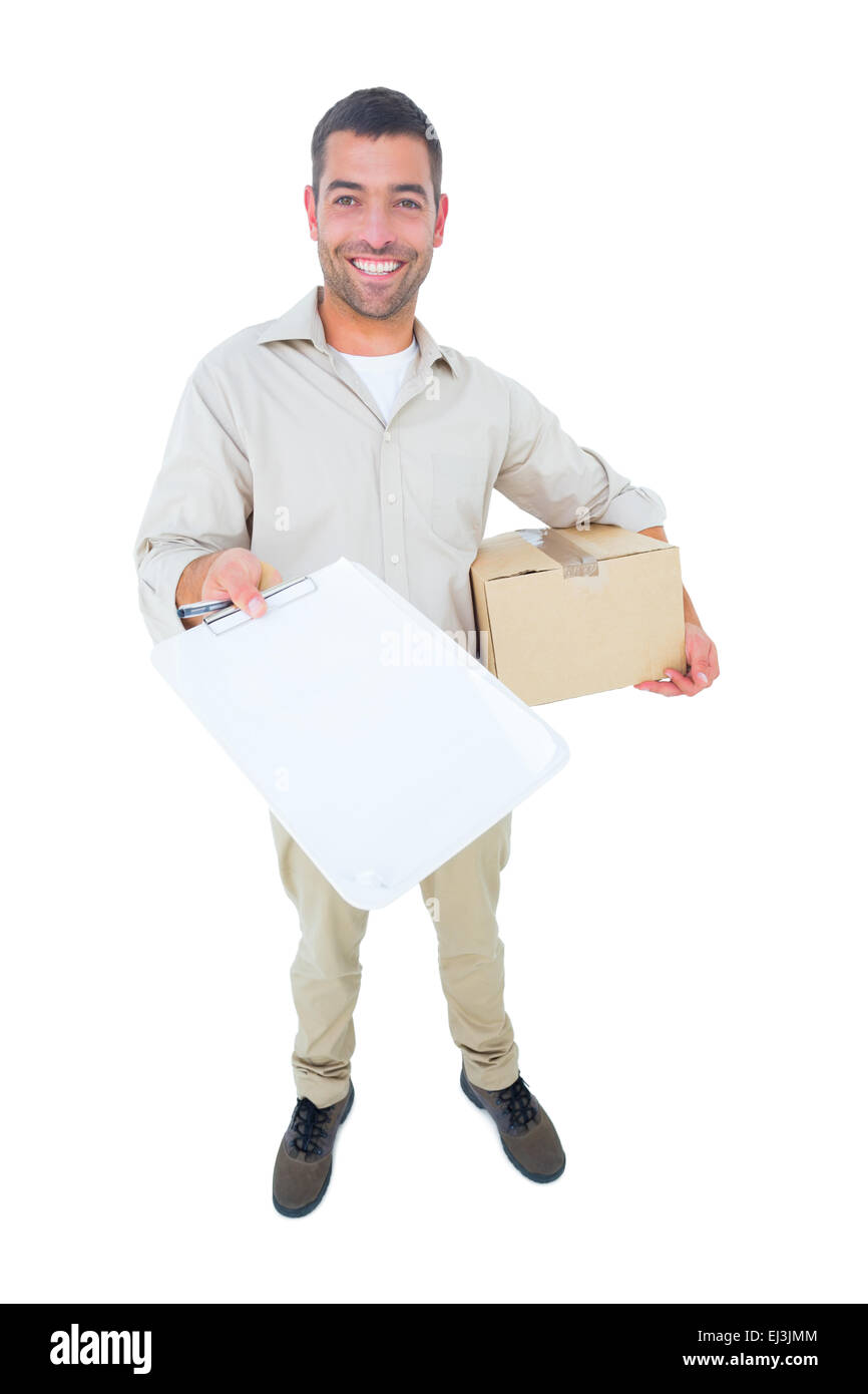 Delivery man with package giving clipboard for signature Stock Photo ...