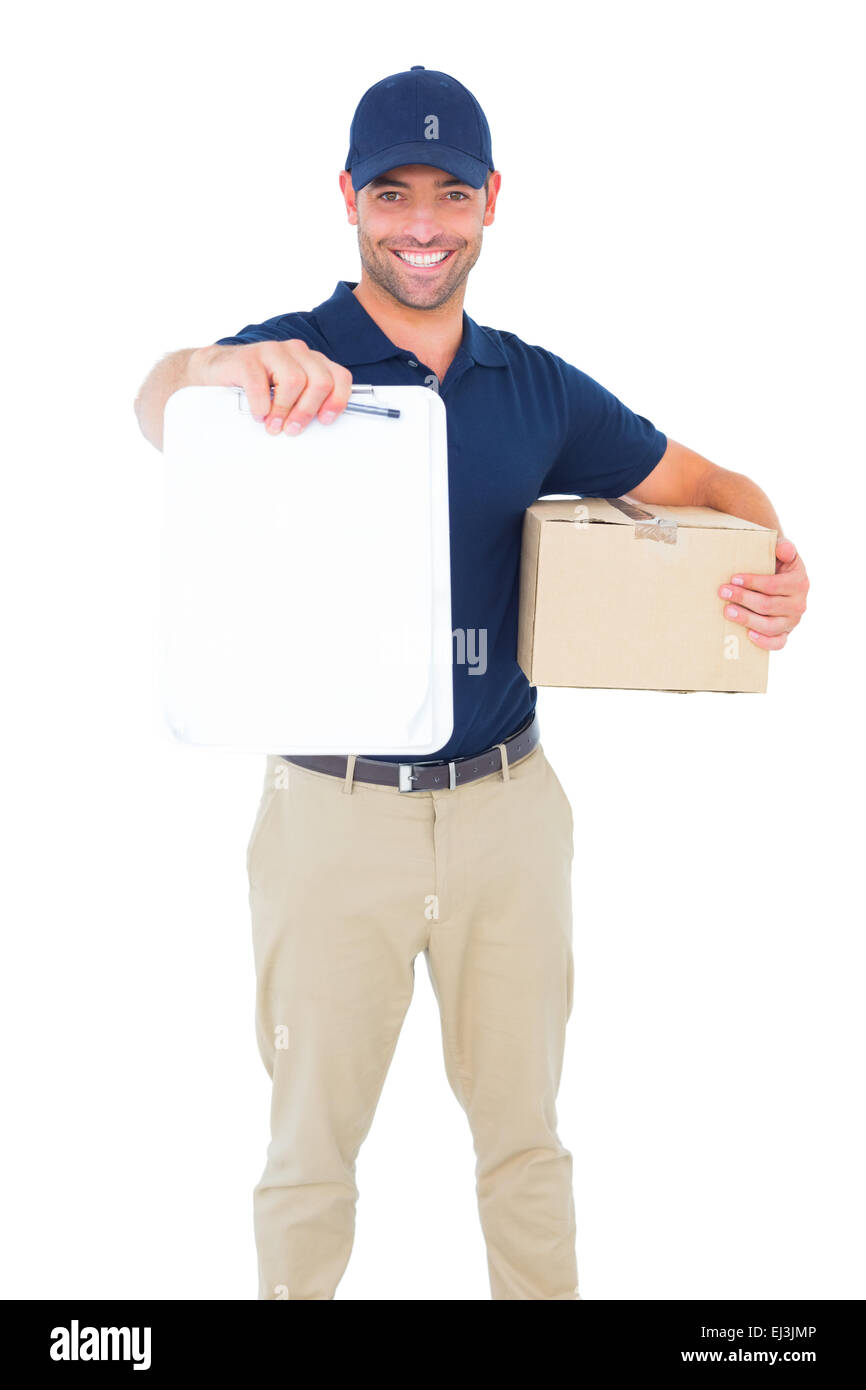 Delivery man with package giving clipboard for signature Stock Photo ...