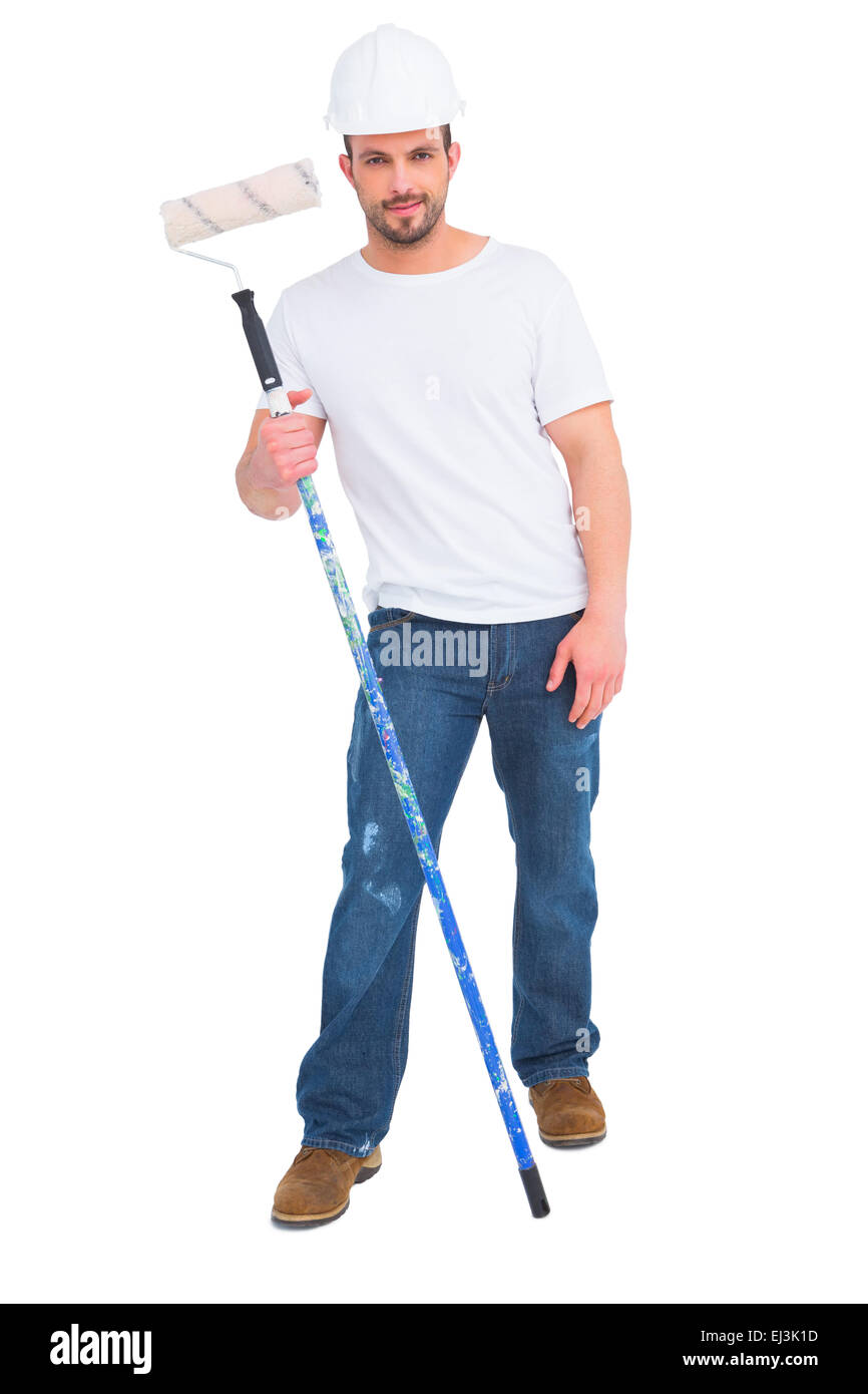 Handyman using paint roller Stock Photo - Alamy