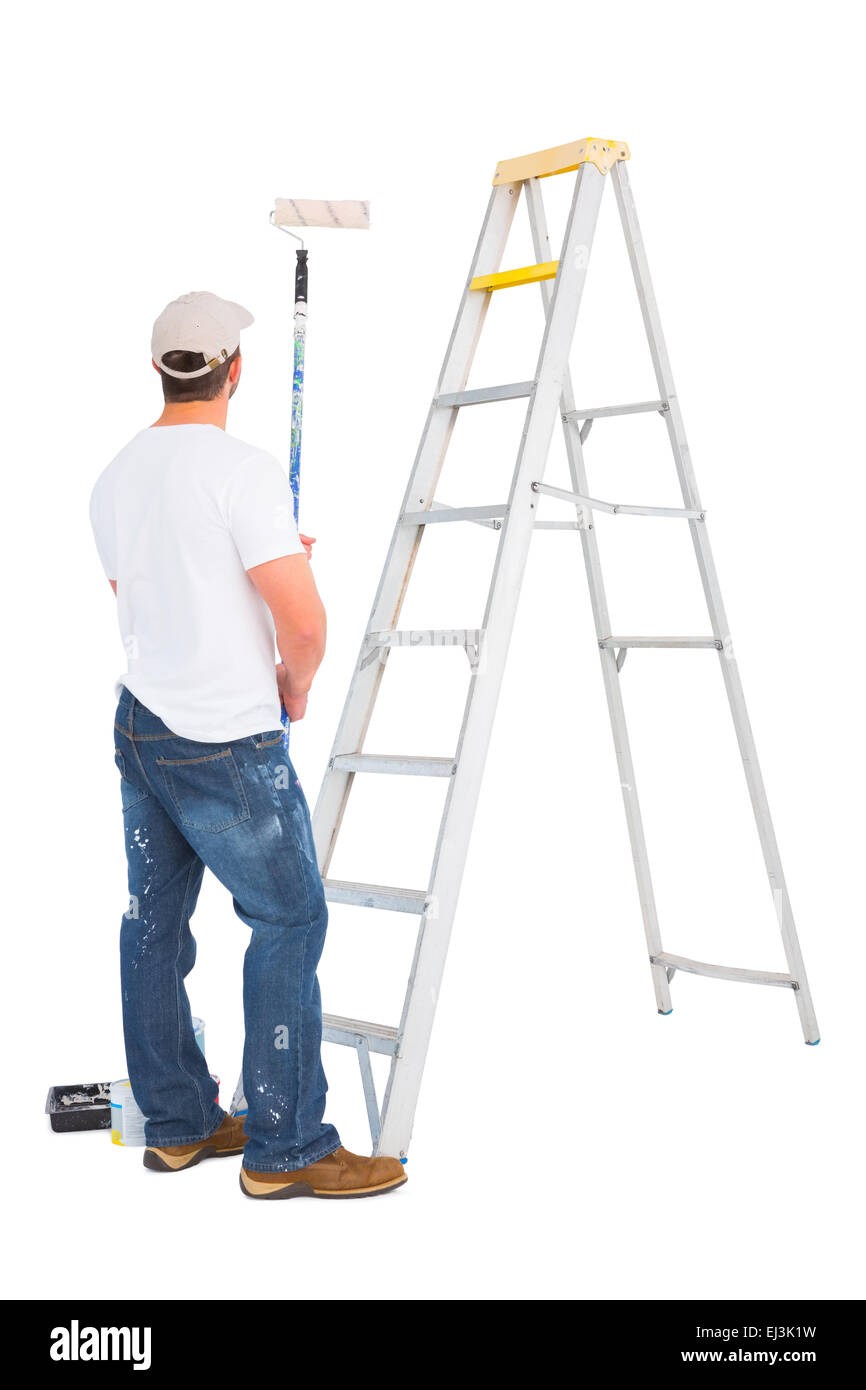 Handyman with paint roller and ladder Stock Photo - Alamy