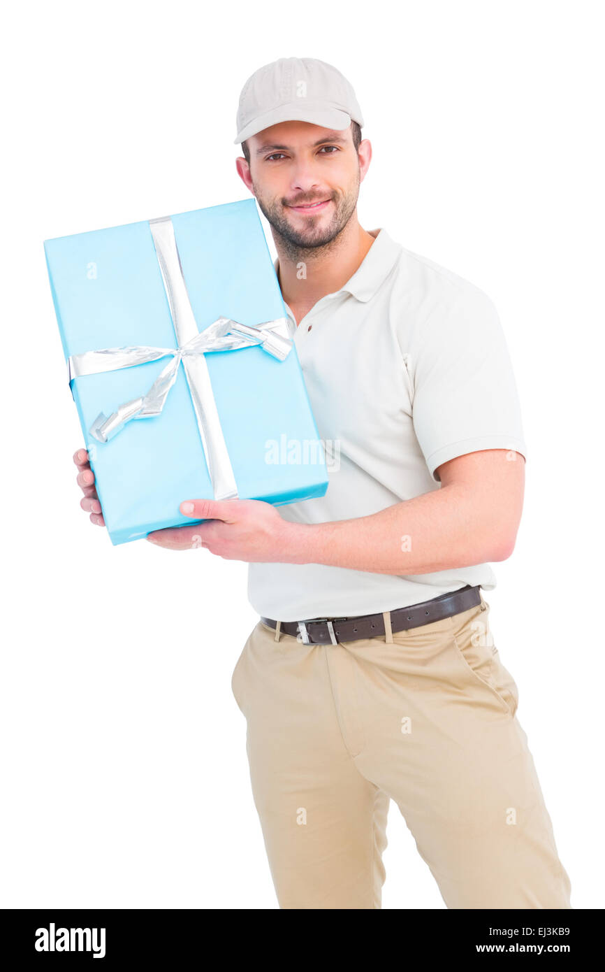Delivery man with cardboard box Stock Photo - Alamy