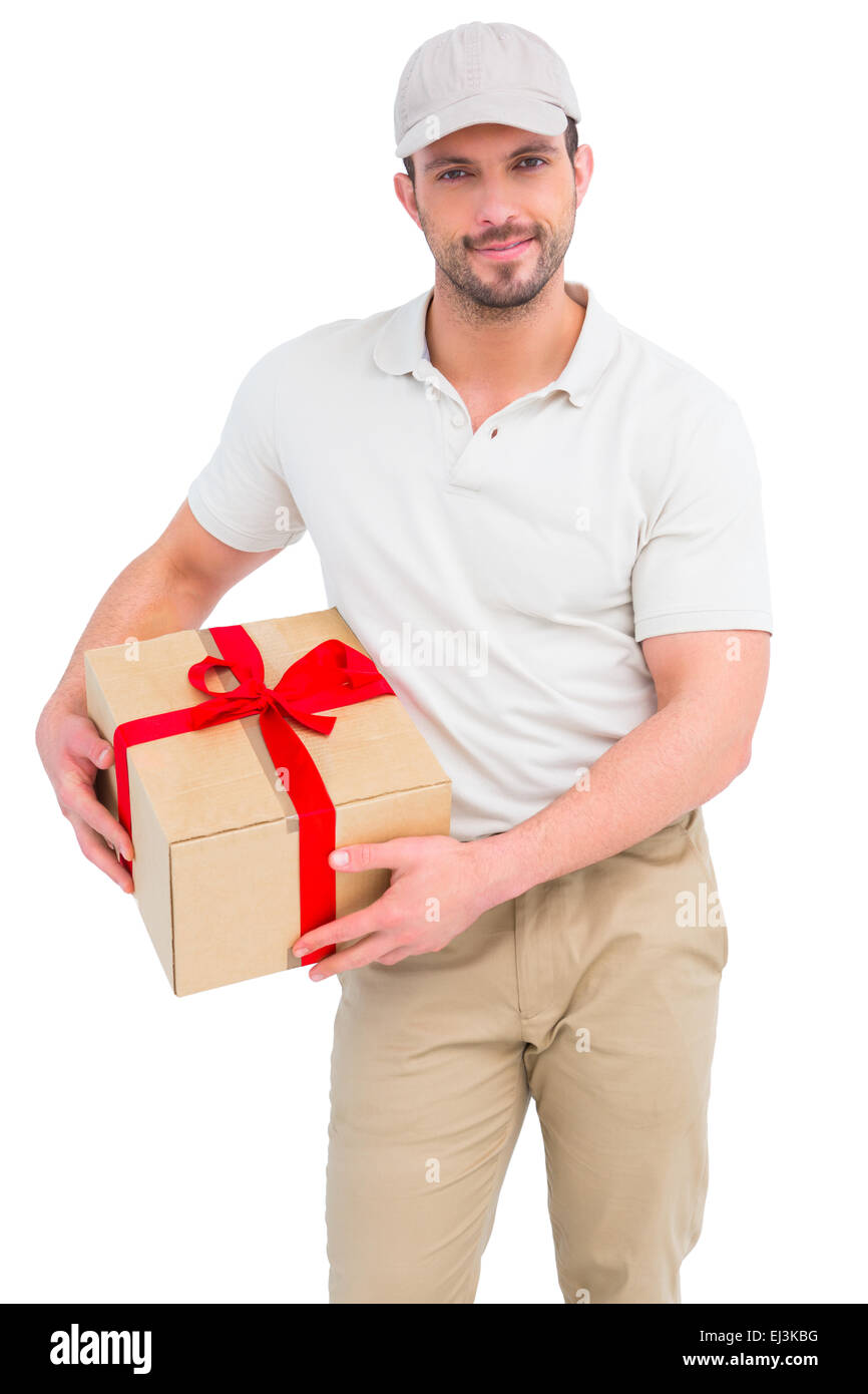 Delivery man with cardboard box Stock Photo - Alamy