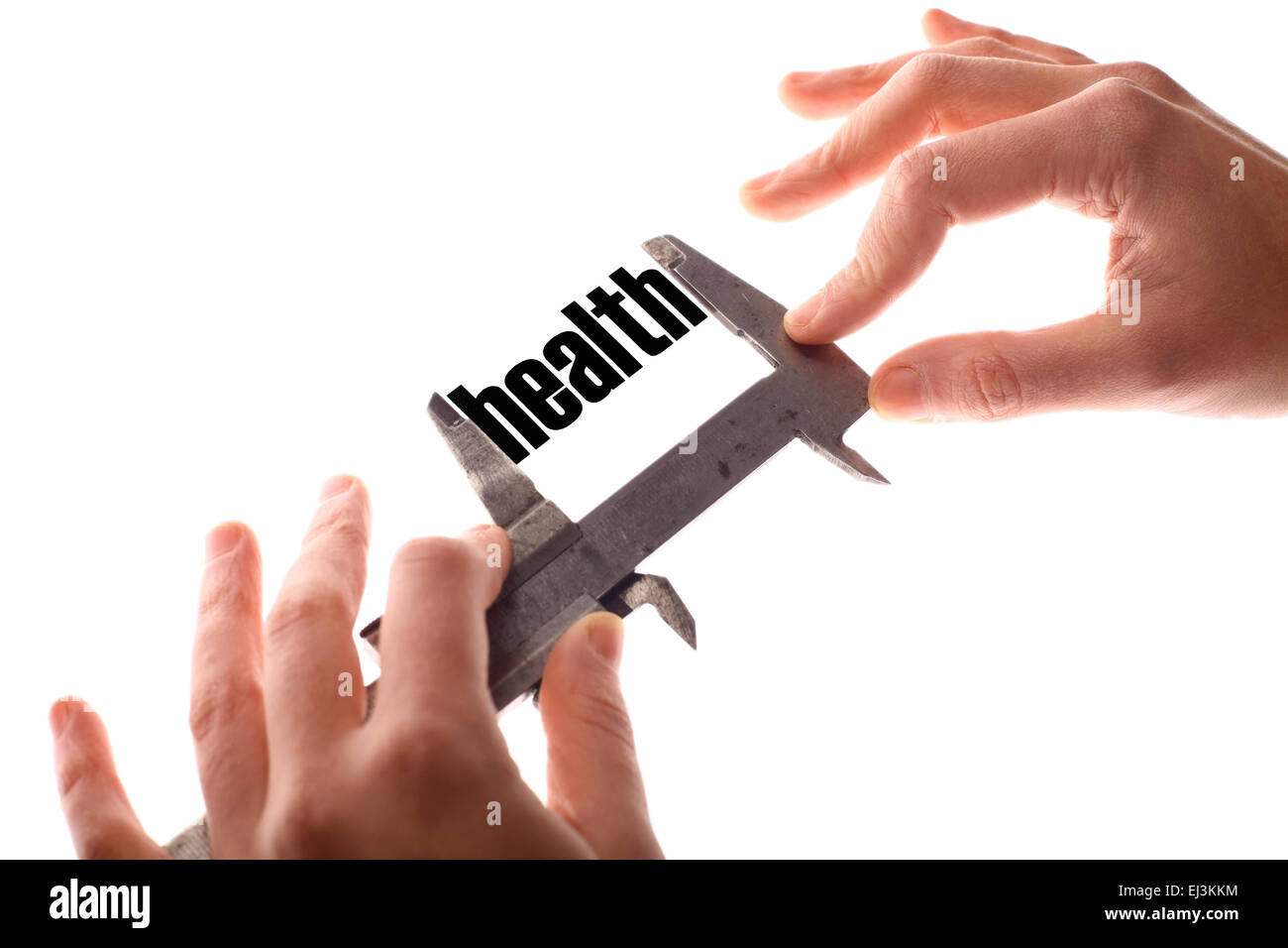 Color horizontal shot of two hands holding a caliper and measuring the ...