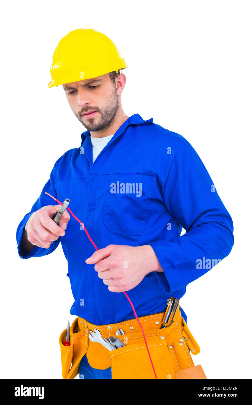 Technician cutting working cable hi-res stock photography and images ...