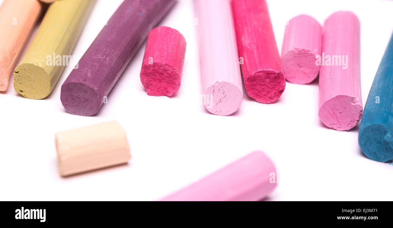 many colorful pastel chalks on white background Stock Photo - Alamy