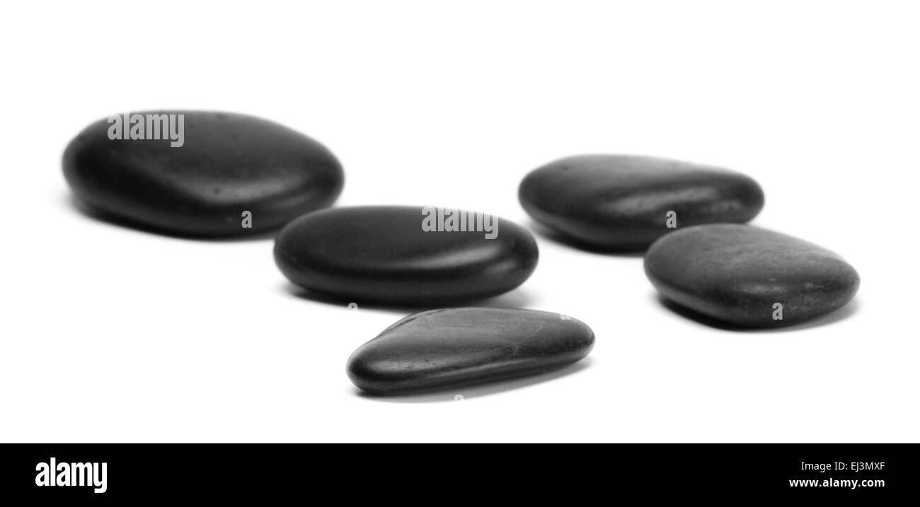 Spa stones on white background Stock Photo - Alamy