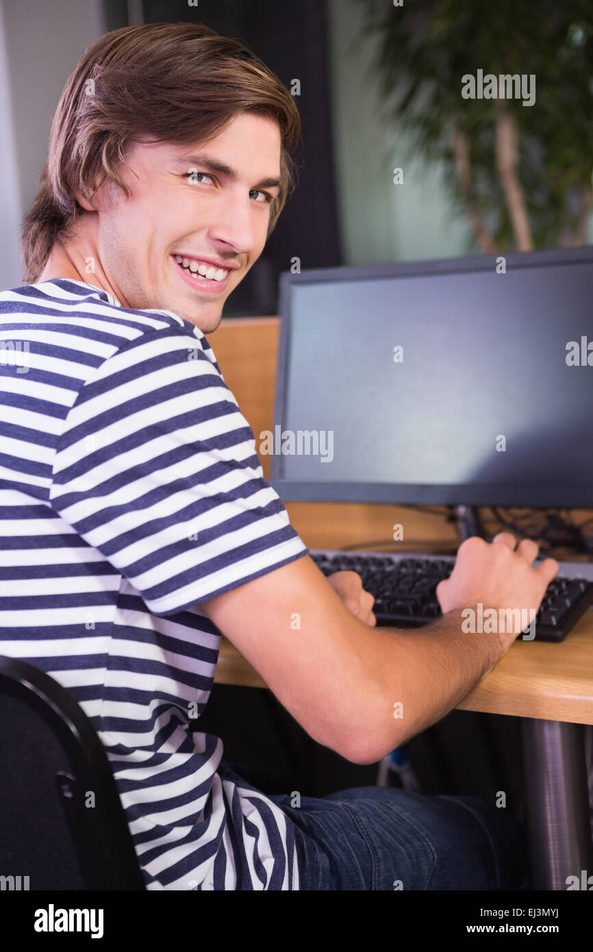 Student using computer in classroom Stock Photo - Alamy