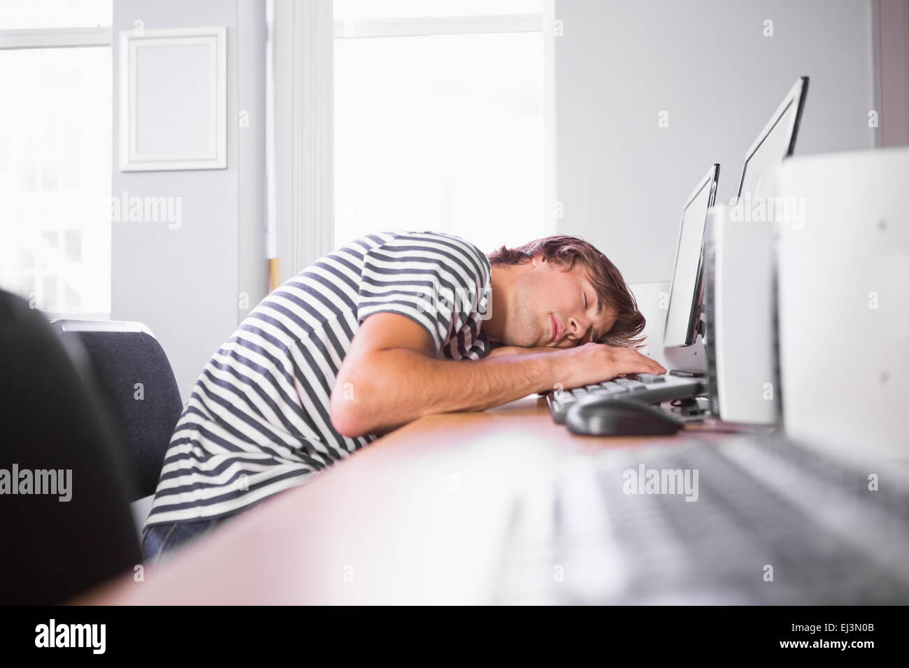 Male student sleeping desk in hi-res stock photography and images - Alamy