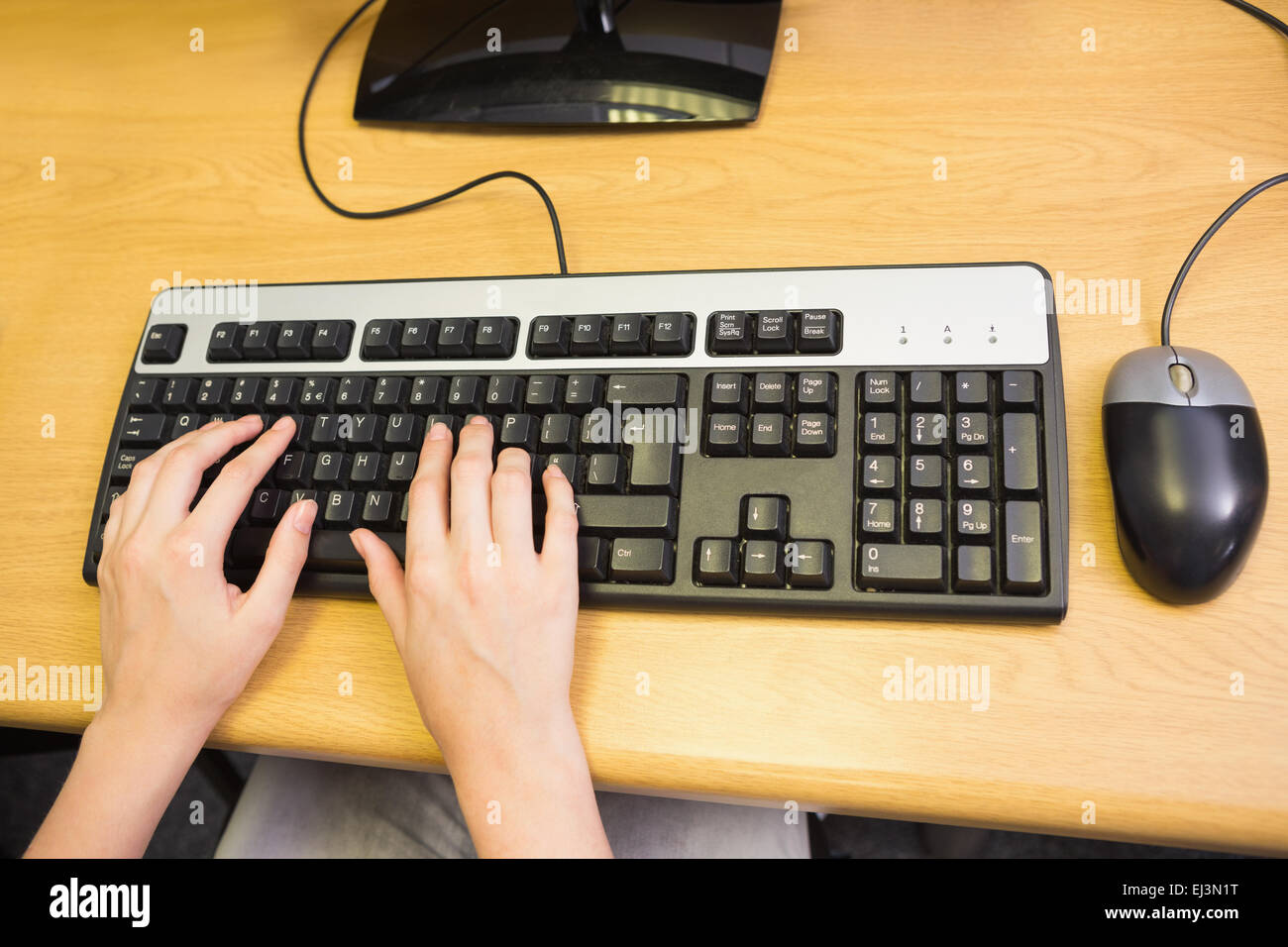 Students working on computer together Stock Photo - Alamy