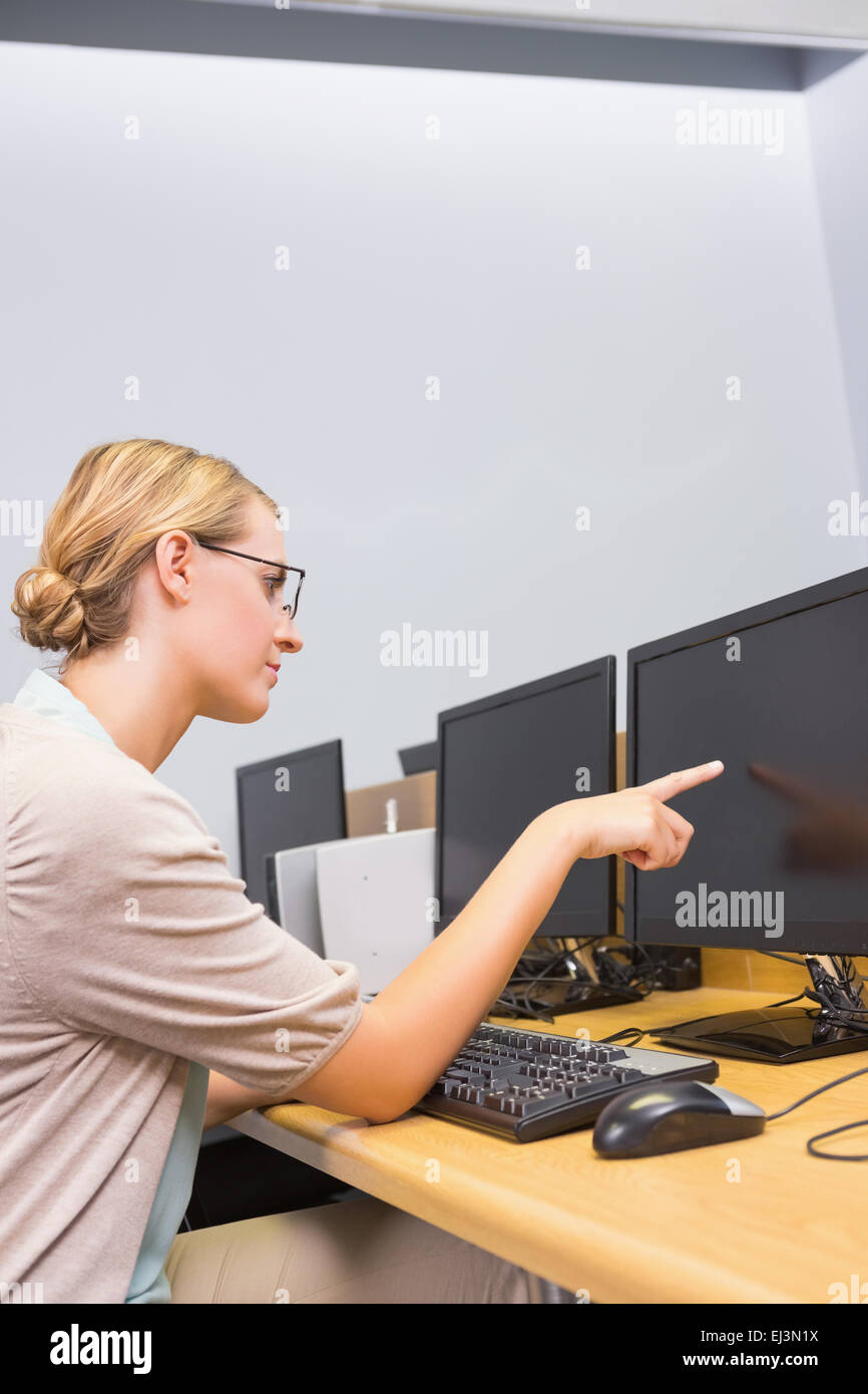 Student working on computer in classroom Stock Photo - Alamy