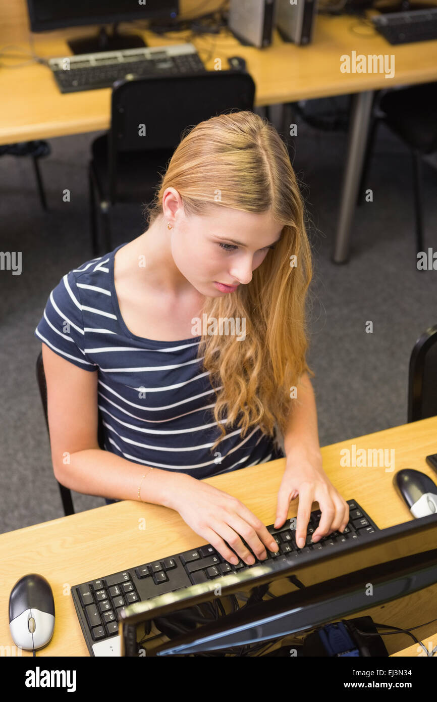 Student working on computer in classroom Stock Photo - Alamy