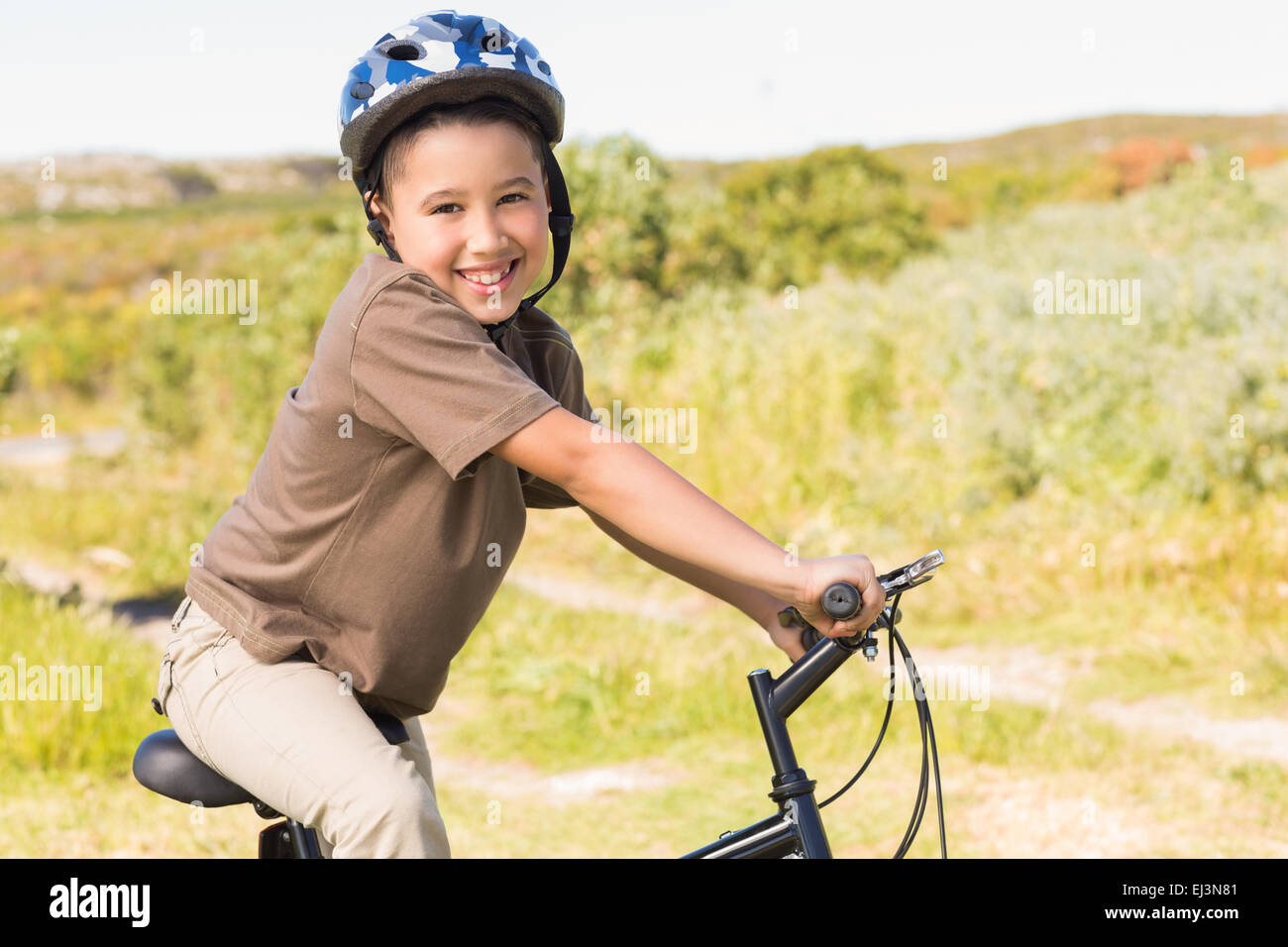 Little boy on a bike ride Stock Photo - Alamy