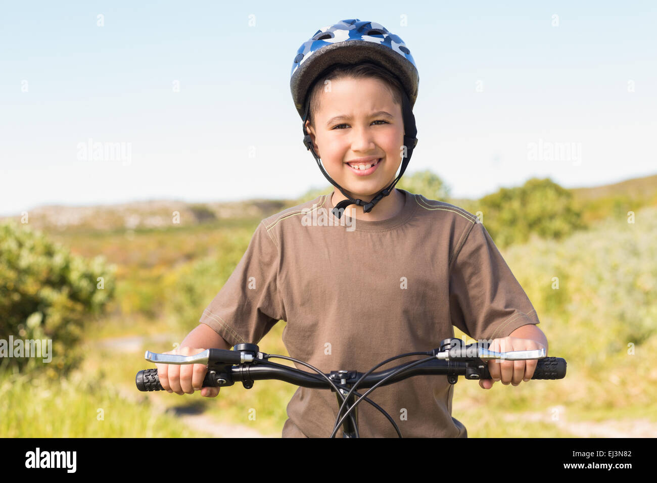 Little boy on bike on hi-res stock photography and images - Alamy