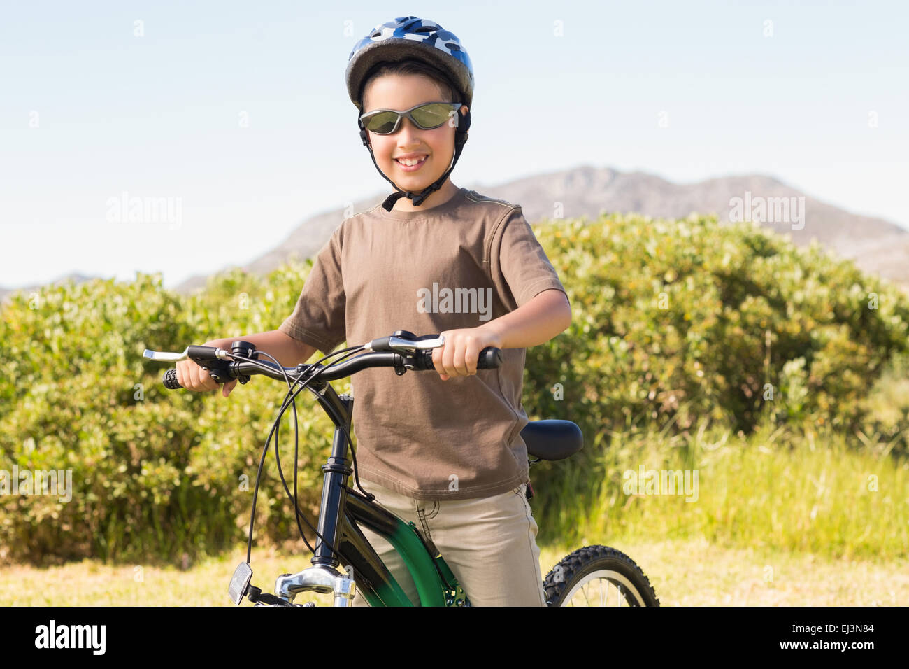 Little boy on bike on hi-res stock photography and images - Alamy