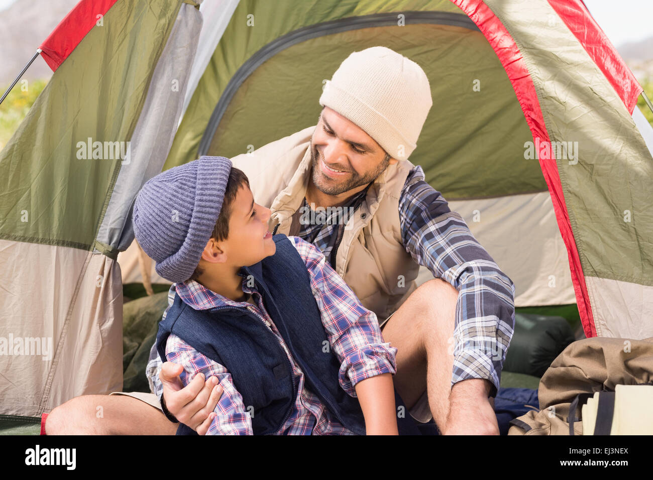 Father and son in their tent Stock Photo - Alamy