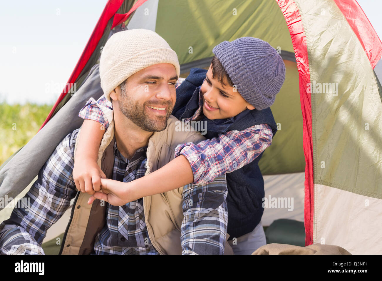 Father and son in their tent Stock Photo - Alamy