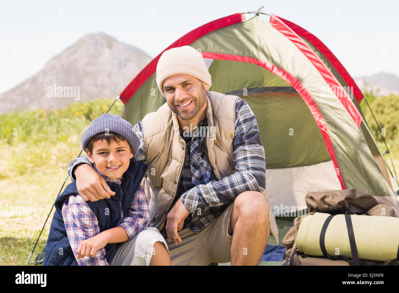 Father and son by their tent Stock Photo - Alamy