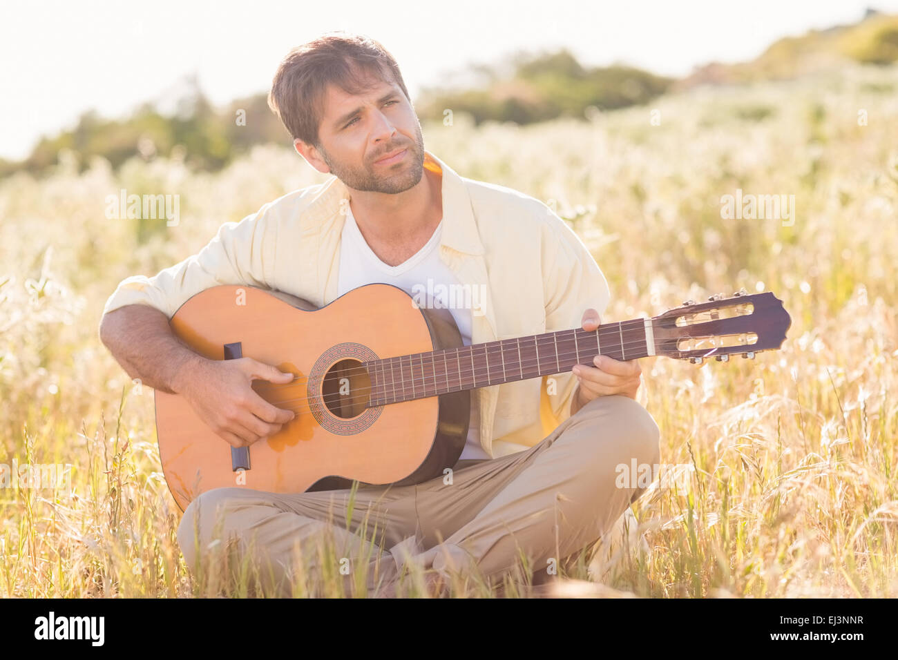 Smiling guitar man life hi-res stock photography and images - Alamy
