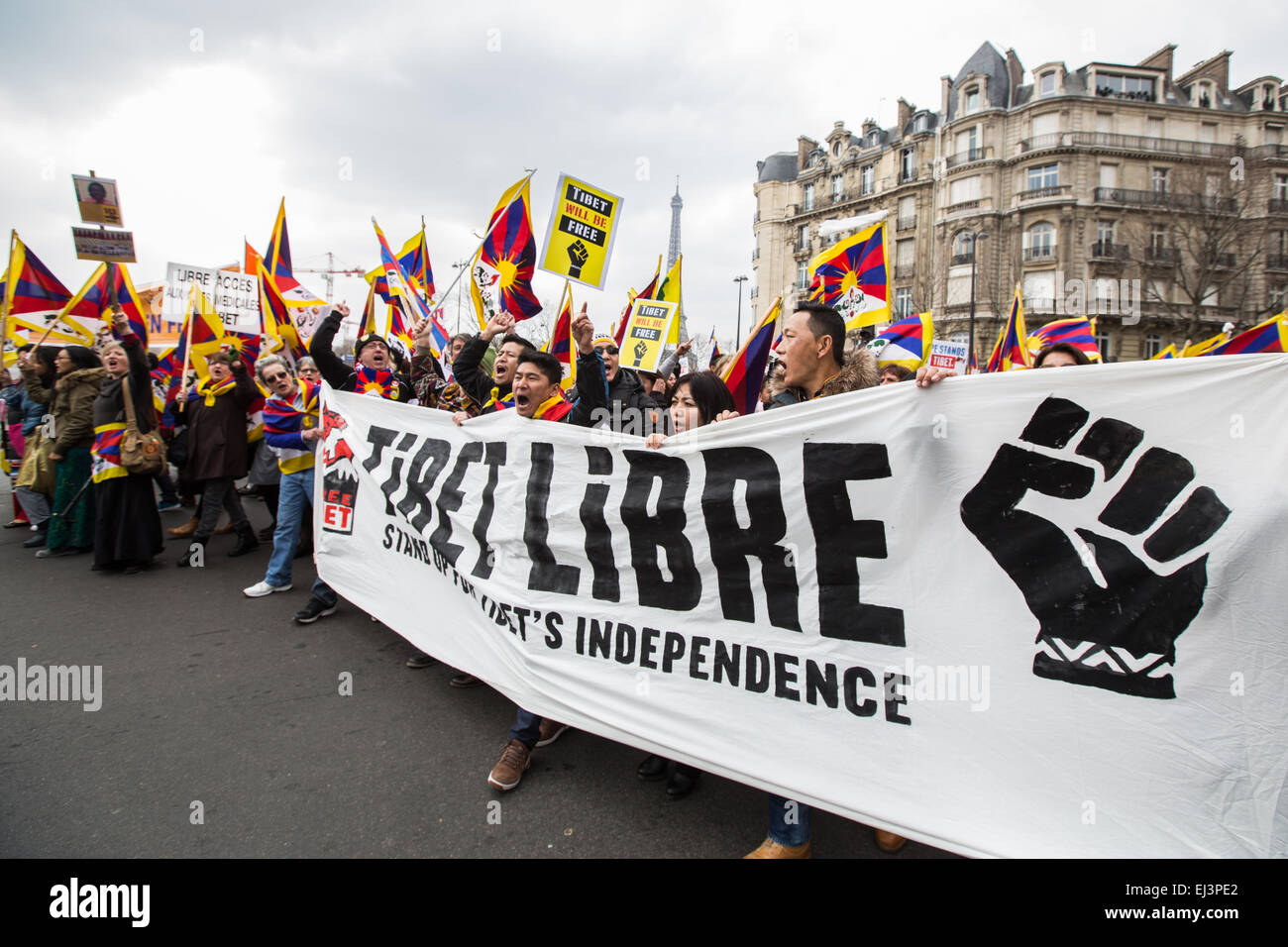 Paris, France. 14th Mar, 2015. Protesters raising flags and banner as a ...
