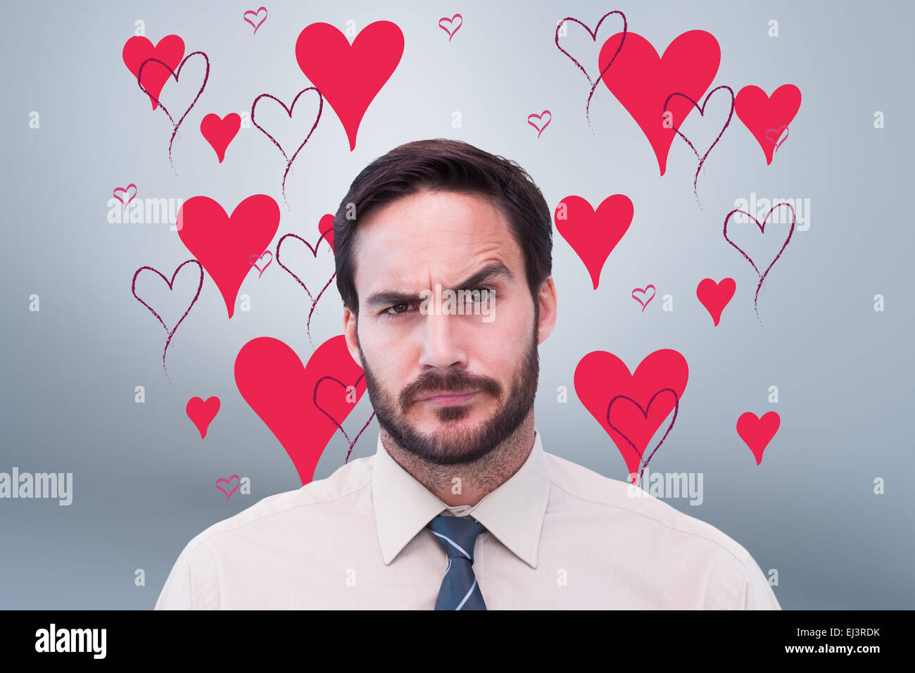 Composite image of portrait of a doubtful young businessman Stock Photo ...