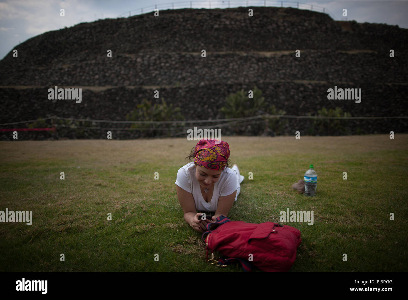 Mexico City, Mexico City. 20th Mar, 2015. A woman awaits the arrival of ...
