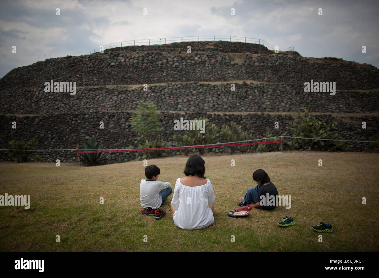 Mexico City, Mexico City. 20th Mar, 2015. A family waits for the ...