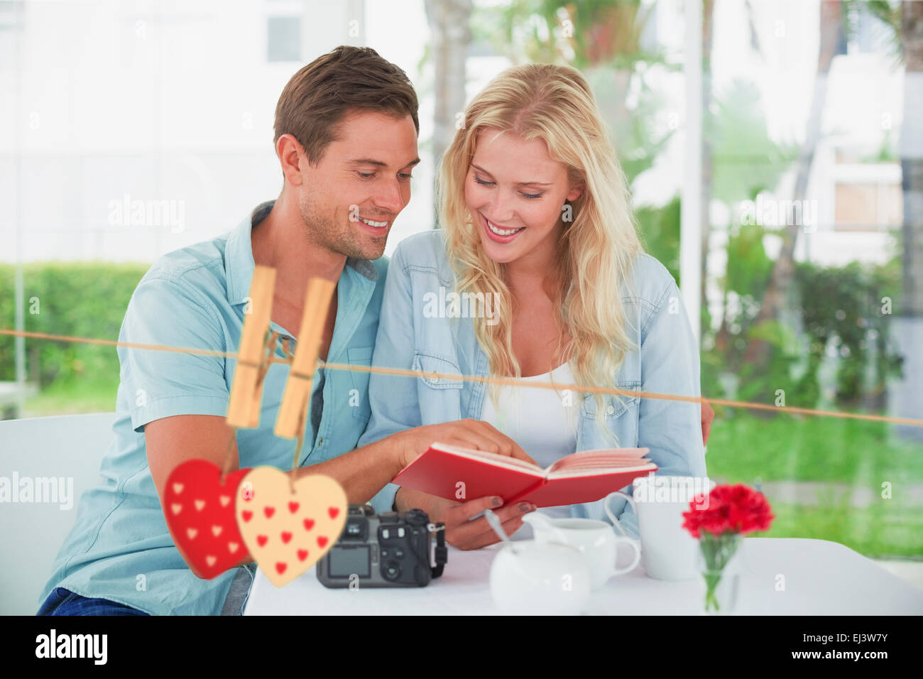 Adult couple reading book hi-res stock photography and images - Alamy