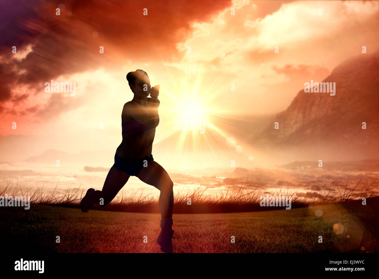 Composite image of fit brunette running and jumping Stock Photo - Alamy