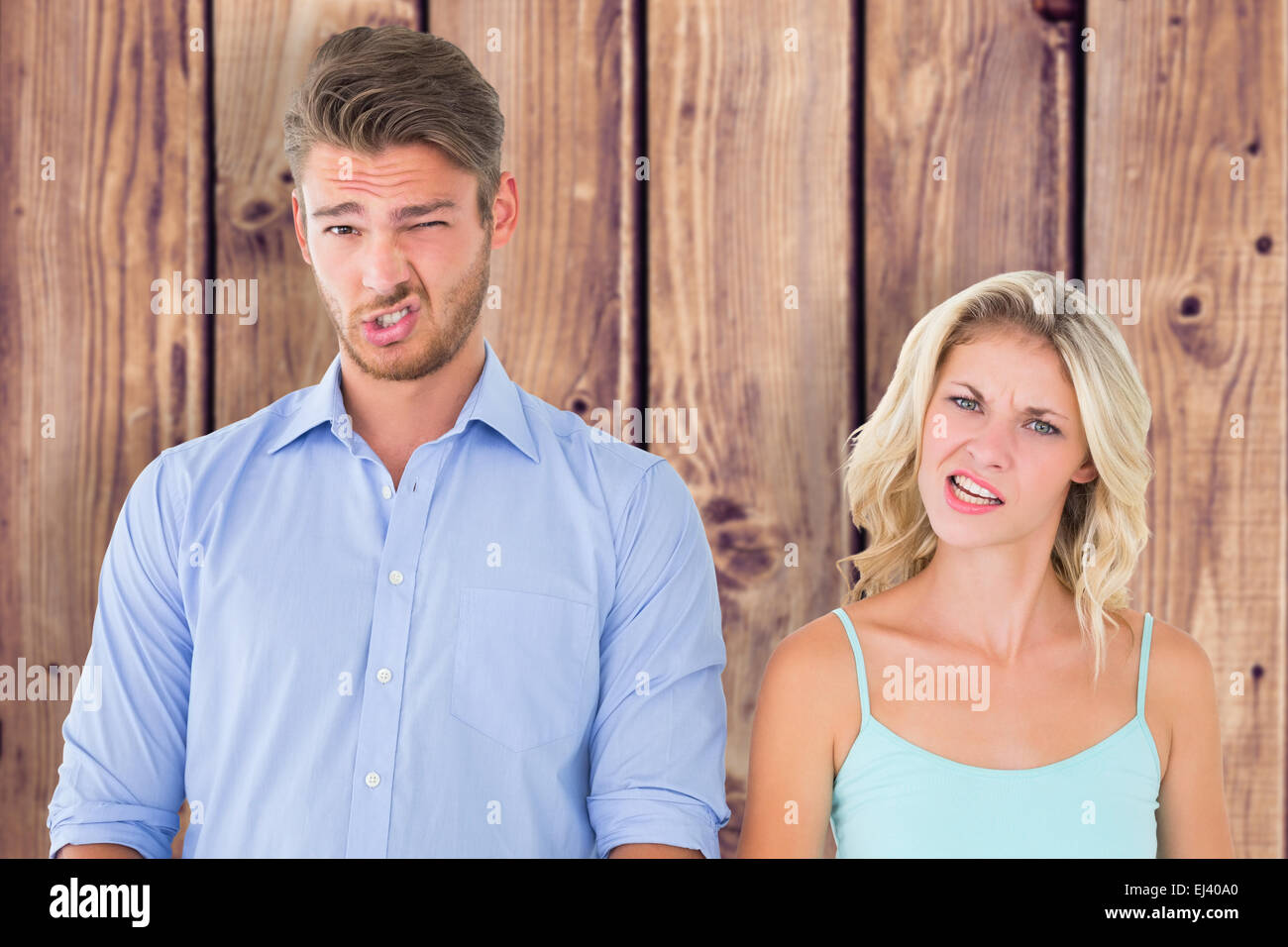 Composite image of young couple making silly faces Stock Photo - Alamy