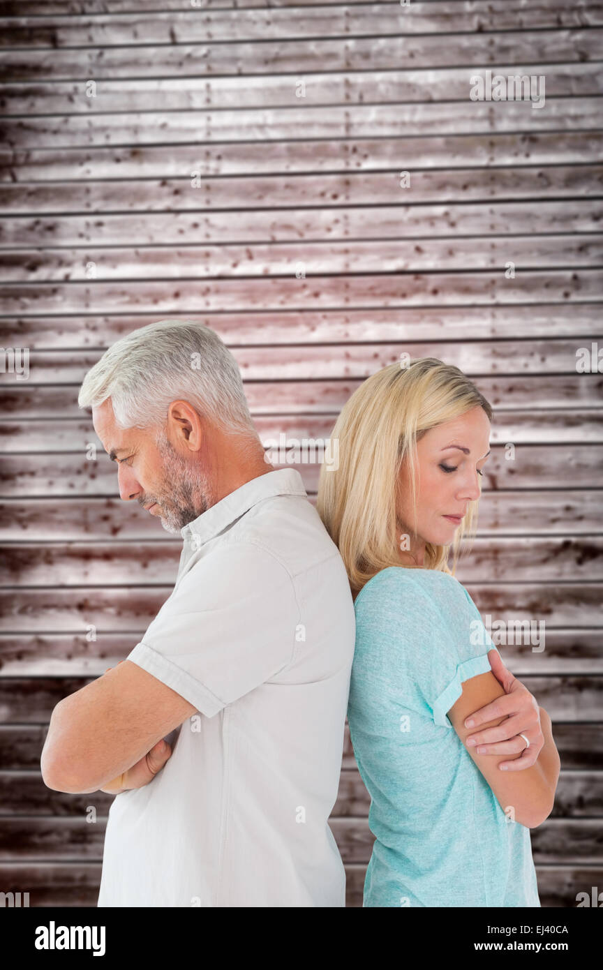 Composite image of unhappy couple not speaking to each other Stock ...