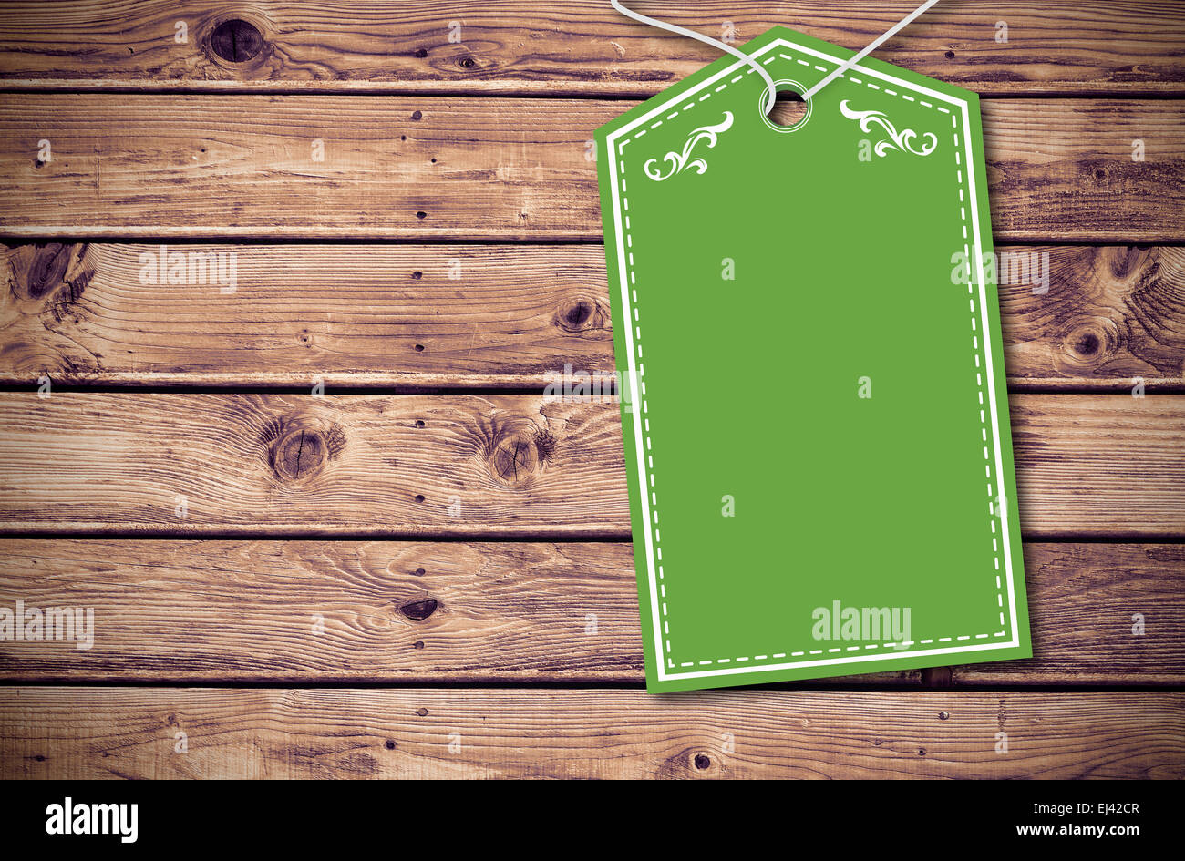 Composite image of elegant green tag Stock Photo - Alamy