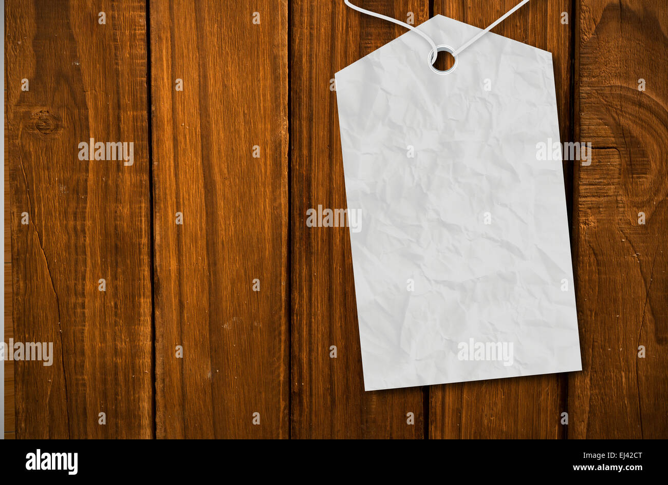 Composite image of crumpled paper tag Stock Photo - Alamy