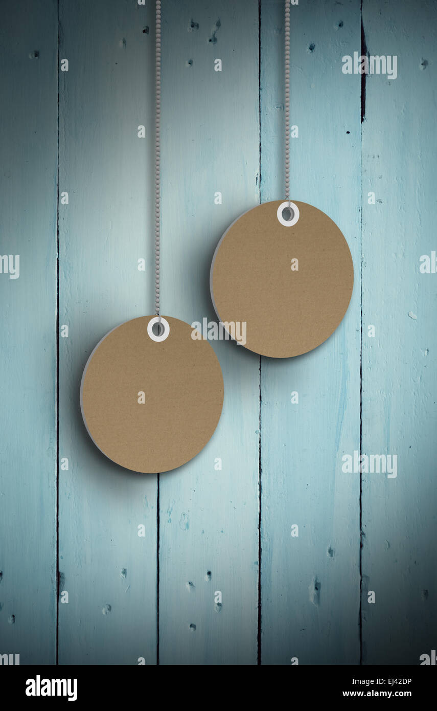 Composite image of circle tag hanging Stock Photo - Alamy