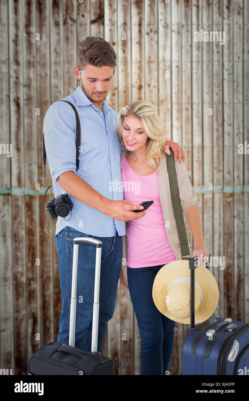 Composite image of attractive young couple ready to go on vacation ...