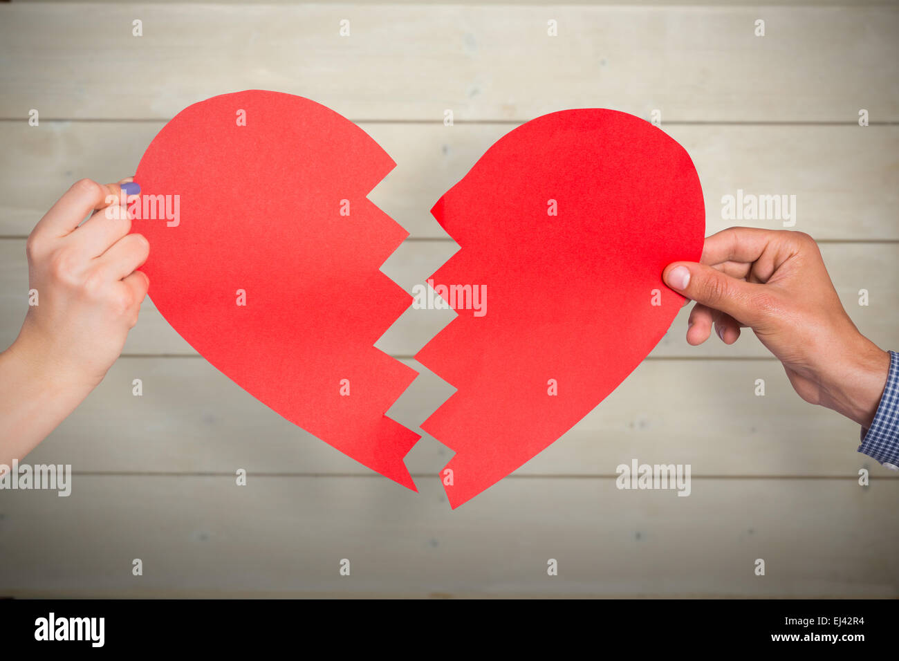 Hands holding broken heart hi-res stock photography and images - Alamy