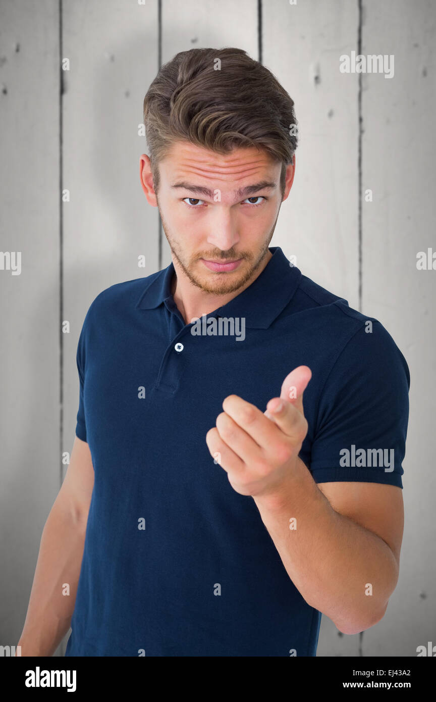 Pointing young man hi-res stock photography and images - Alamy