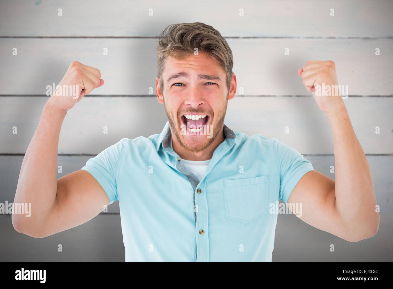 Image handsome excited young hi-res stock photography and images - Alamy