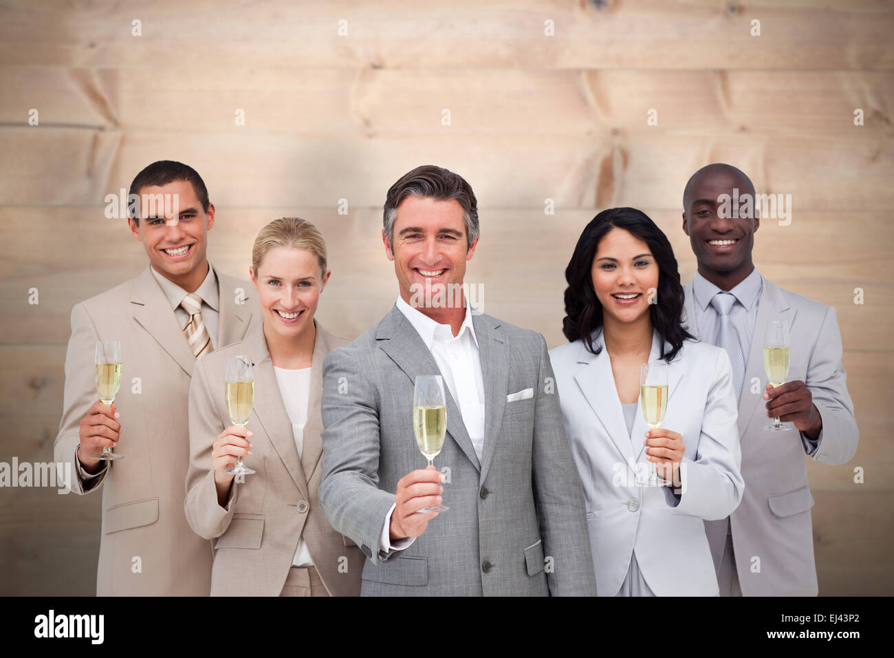 Composite image of business team celebrating a success with champagne ...