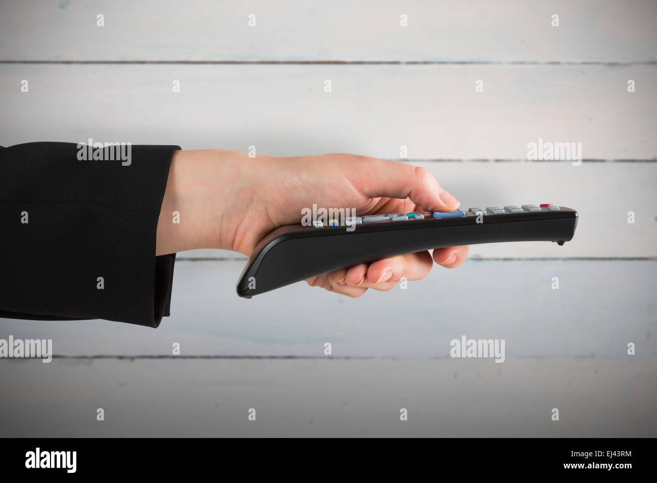 Hand with remote hi-res stock photography and images - Alamy