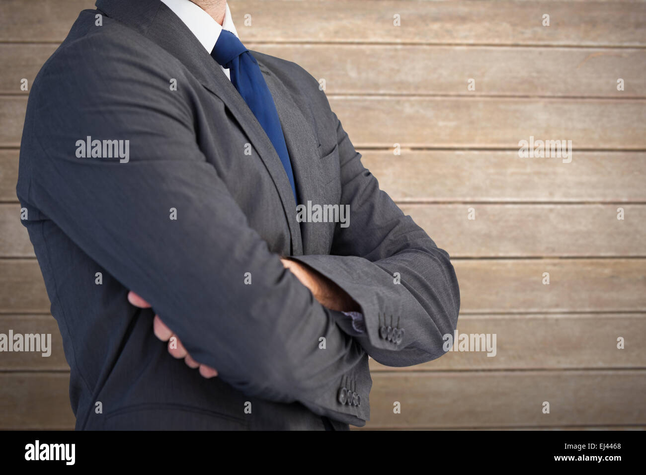 Man folded arms suit hi-res stock photography and images - Alamy