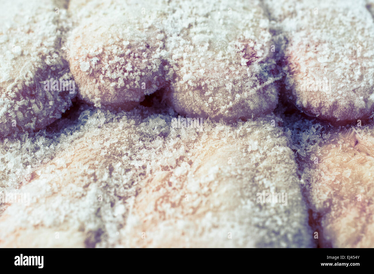Frozen chicken wings block in the store Stock Photo - Alamy