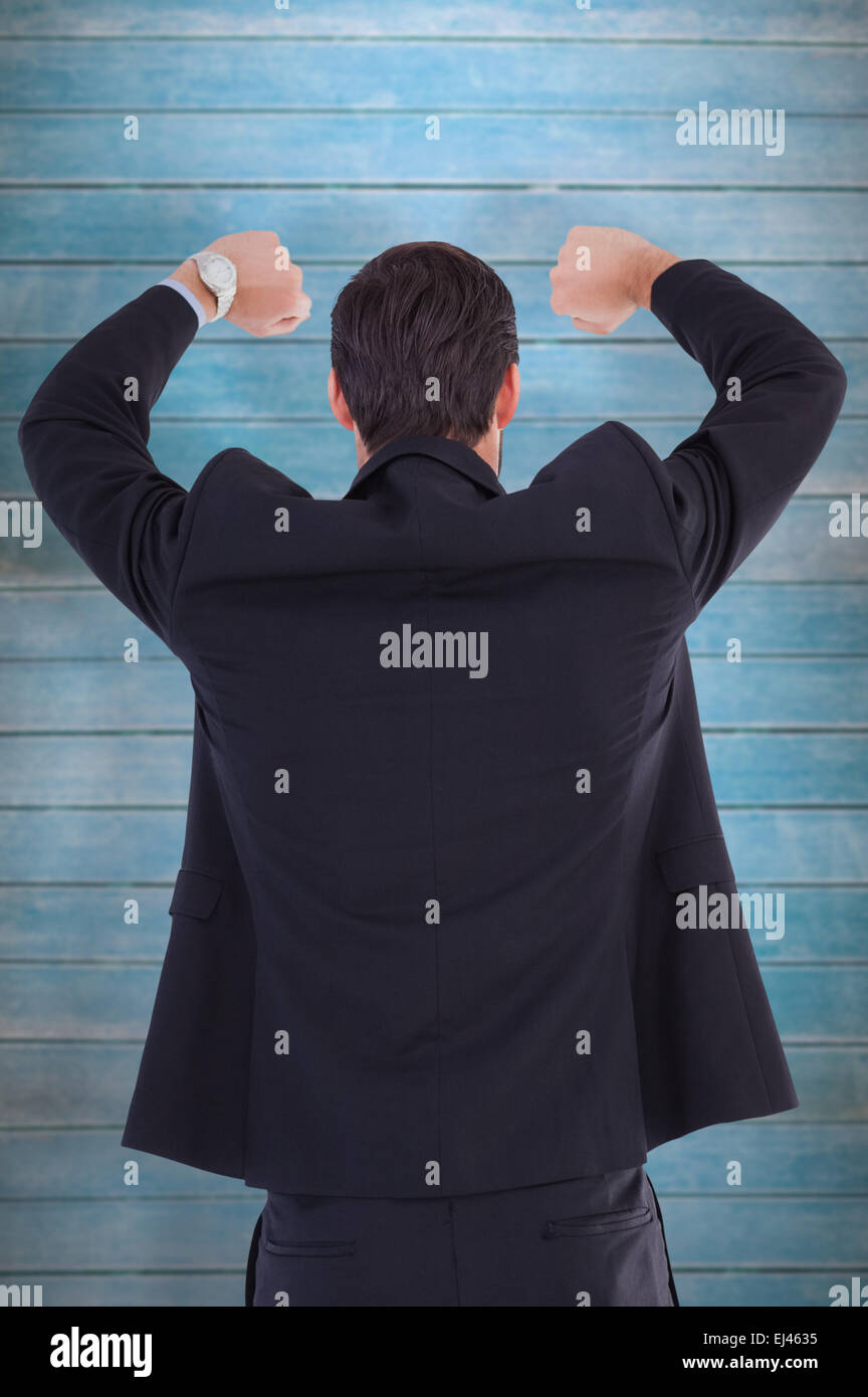 Rear view male raised hands hi-res stock photography and images - Alamy