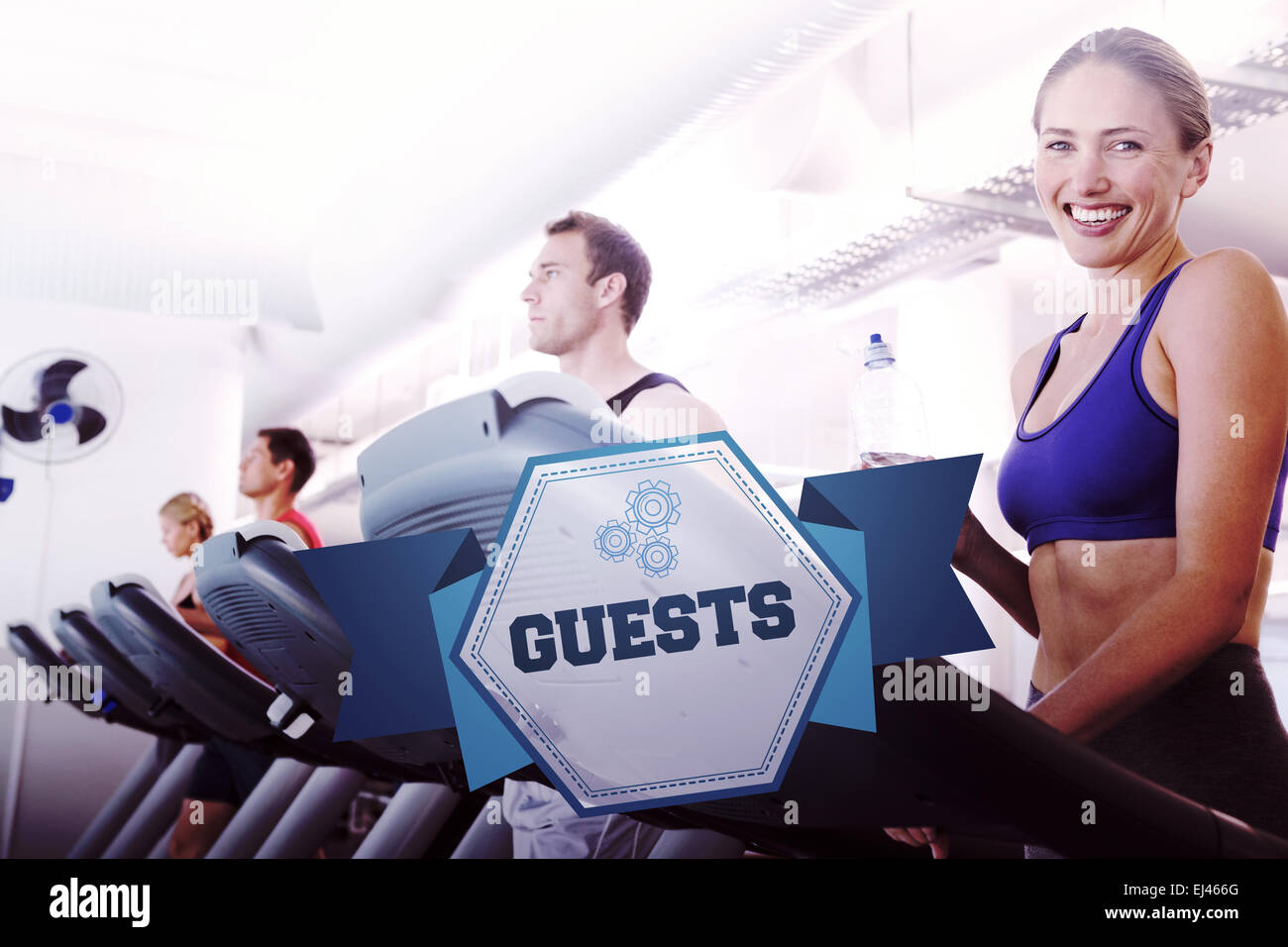 The word guests and row of people working out on treadmills Stock Photo ...