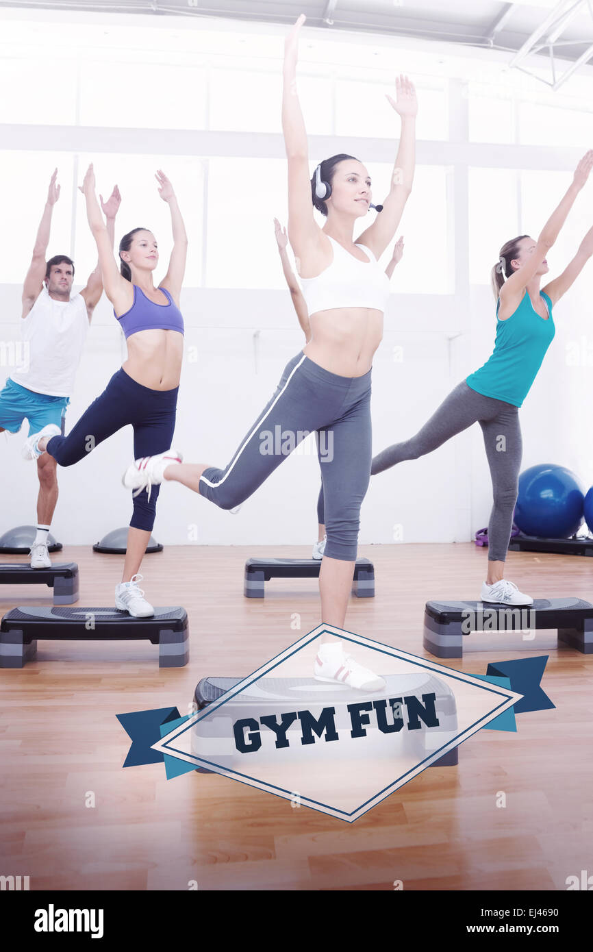 Gym fun against badge Stock Photo - Alamy