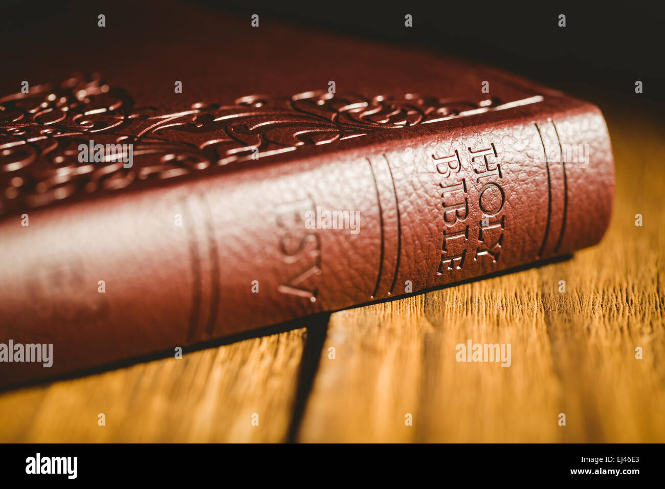 Bible on wooden table Stock Photo - Alamy