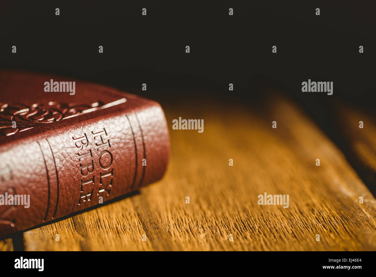 Bible on wooden table Stock Photo - Alamy