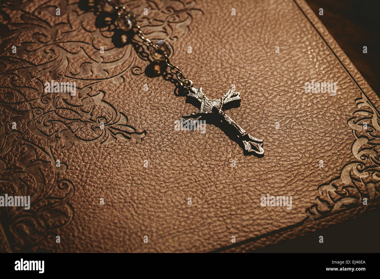 Rosary beads with bible Stock Photo - Alamy