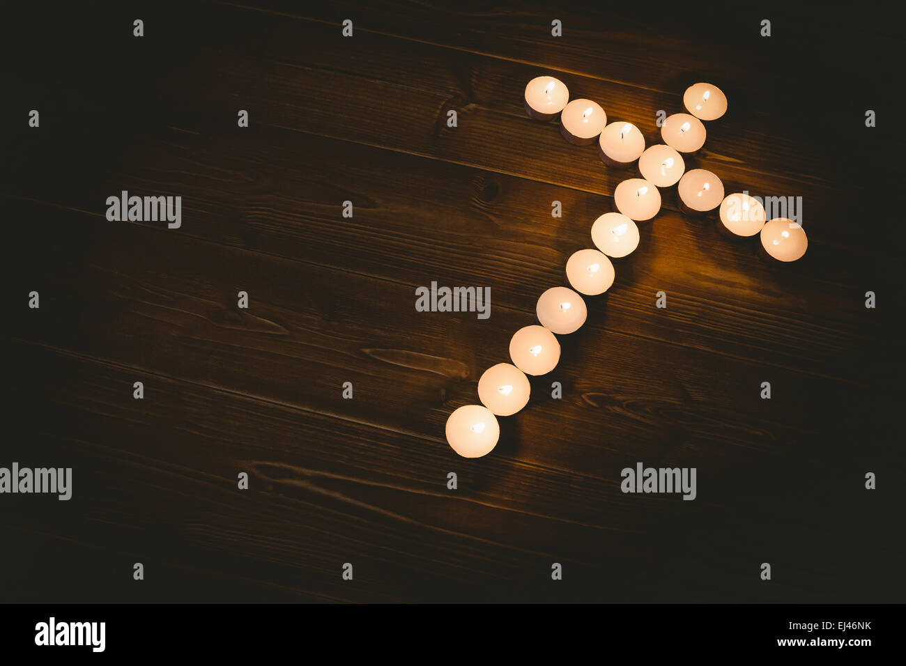 Candles in shape of cross Stock Photo - Alamy