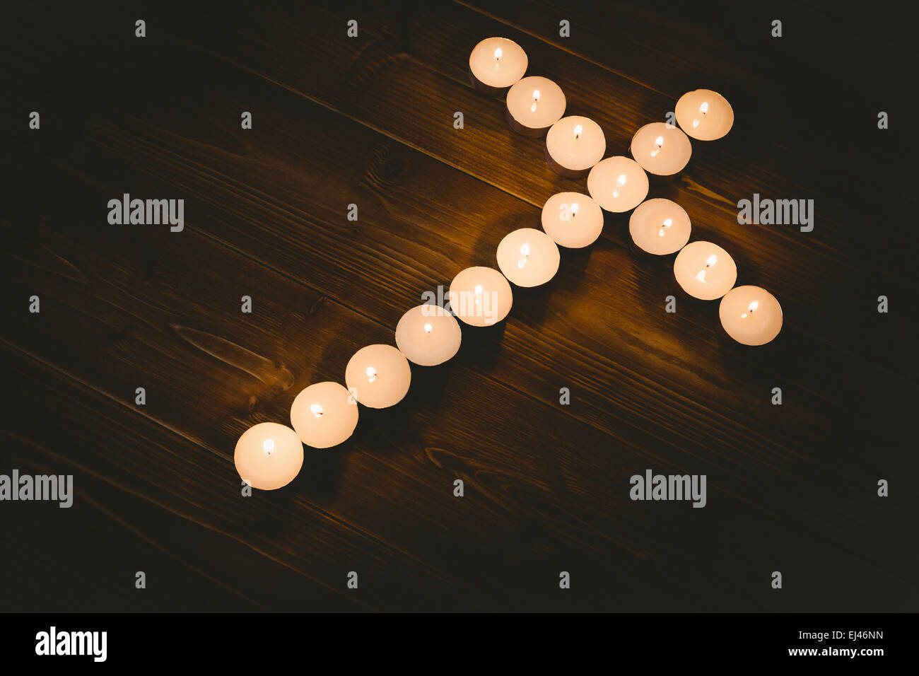 Candles in shape of cross Stock Photo - Alamy