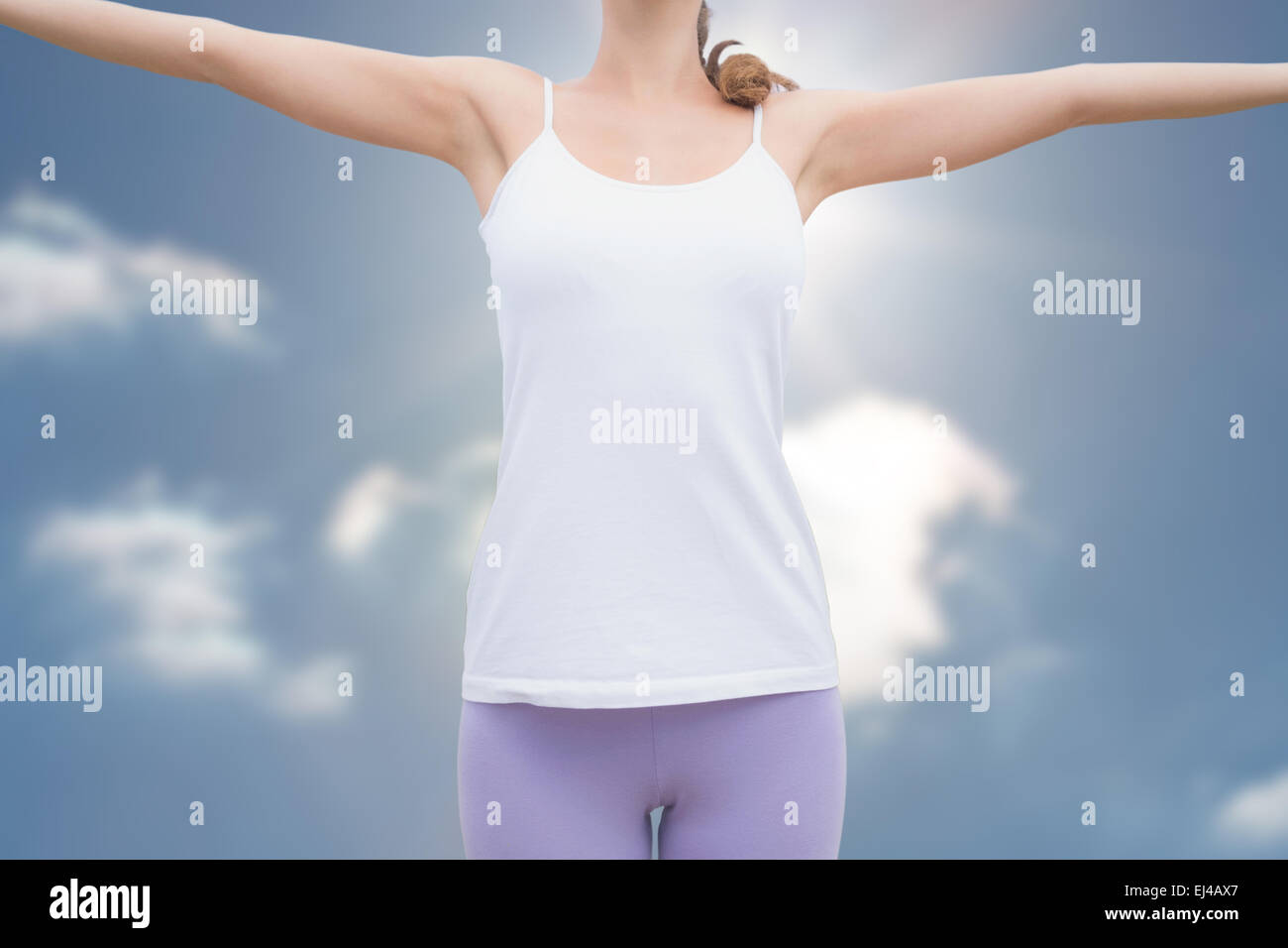 Woman standing raised arms hi-res stock photography and images - Alamy